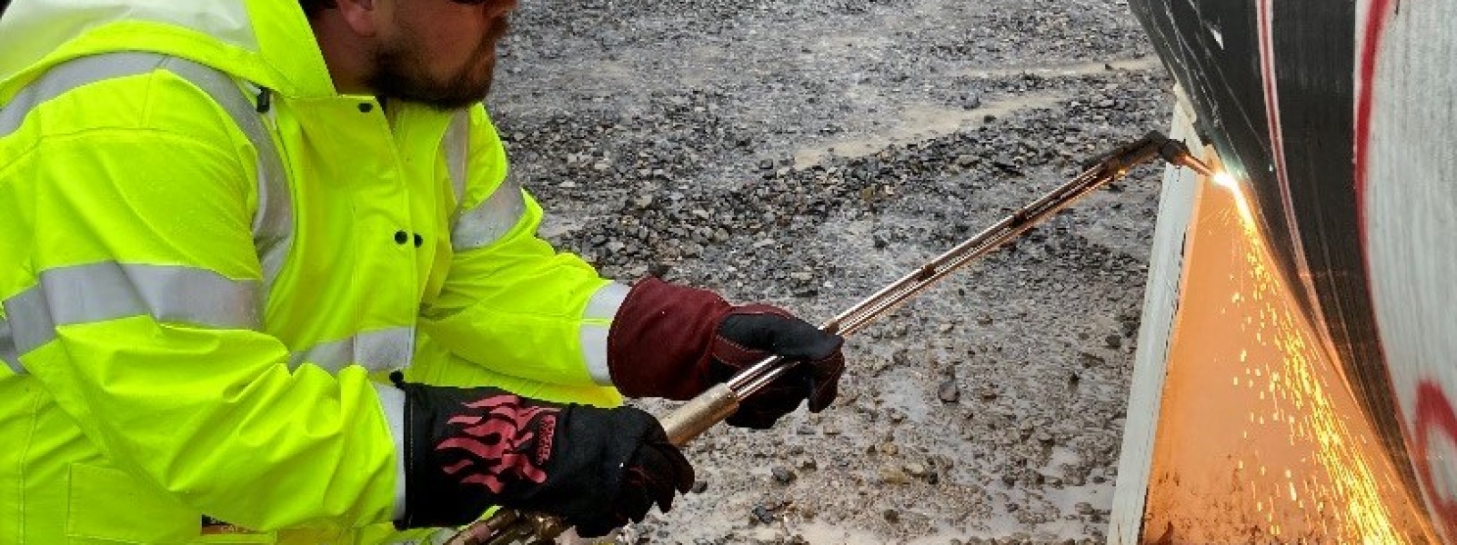 Steven cutting tanks to recycle | Midland Resource Recovery